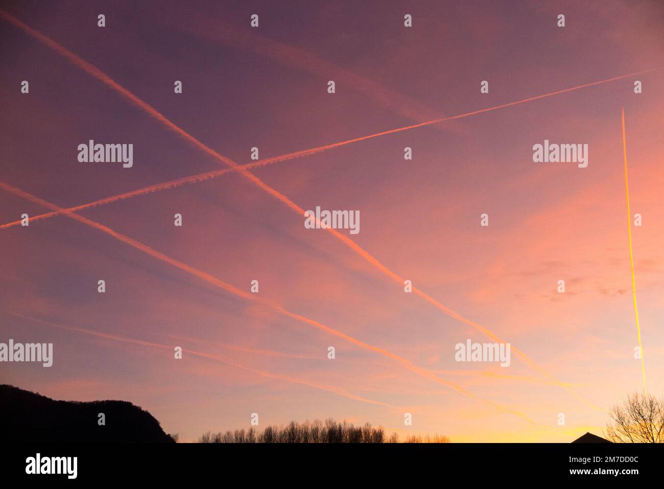 Jet aeroplane vapour trail showing flight corridors against a sky at ...