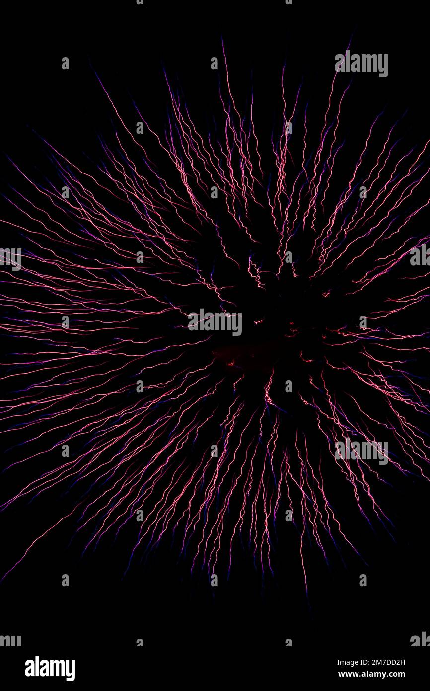 Multicoloured explosions of coloured sparks in a dark as fireworks ...