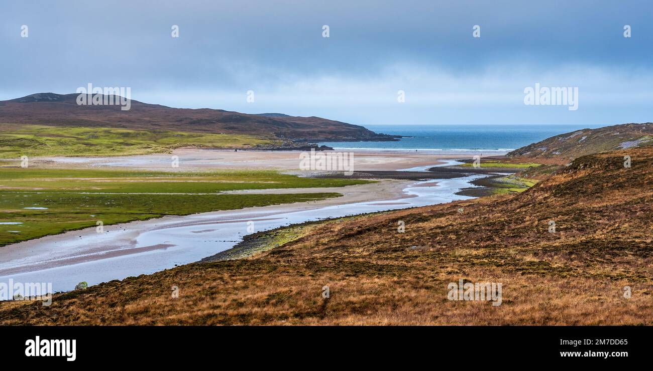 Panoramic view of the Allt Loch Ra tidal river and the golden sand of ...