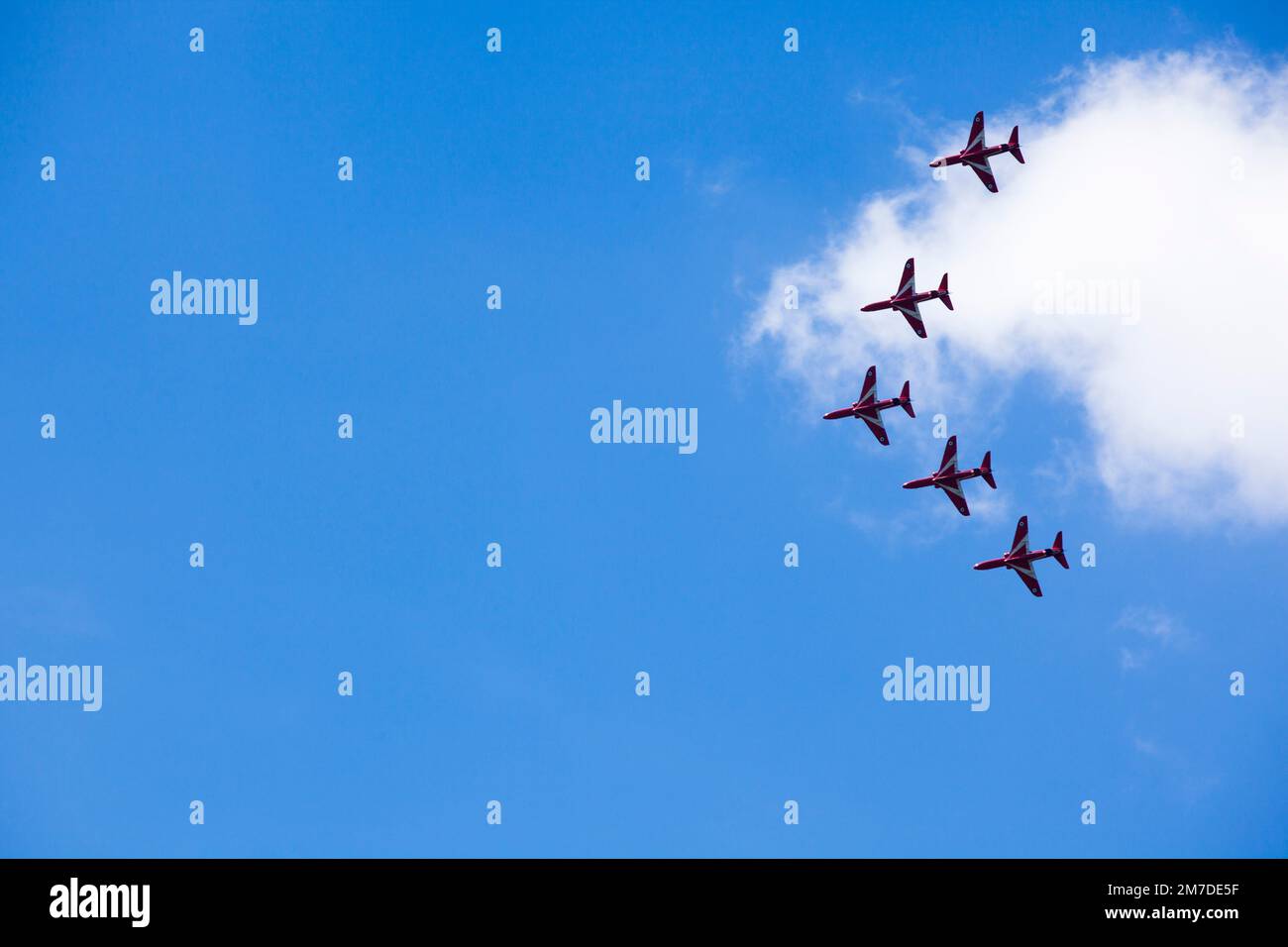 The famous Red arrows acrobatic aeroplane display team fly past in a ...