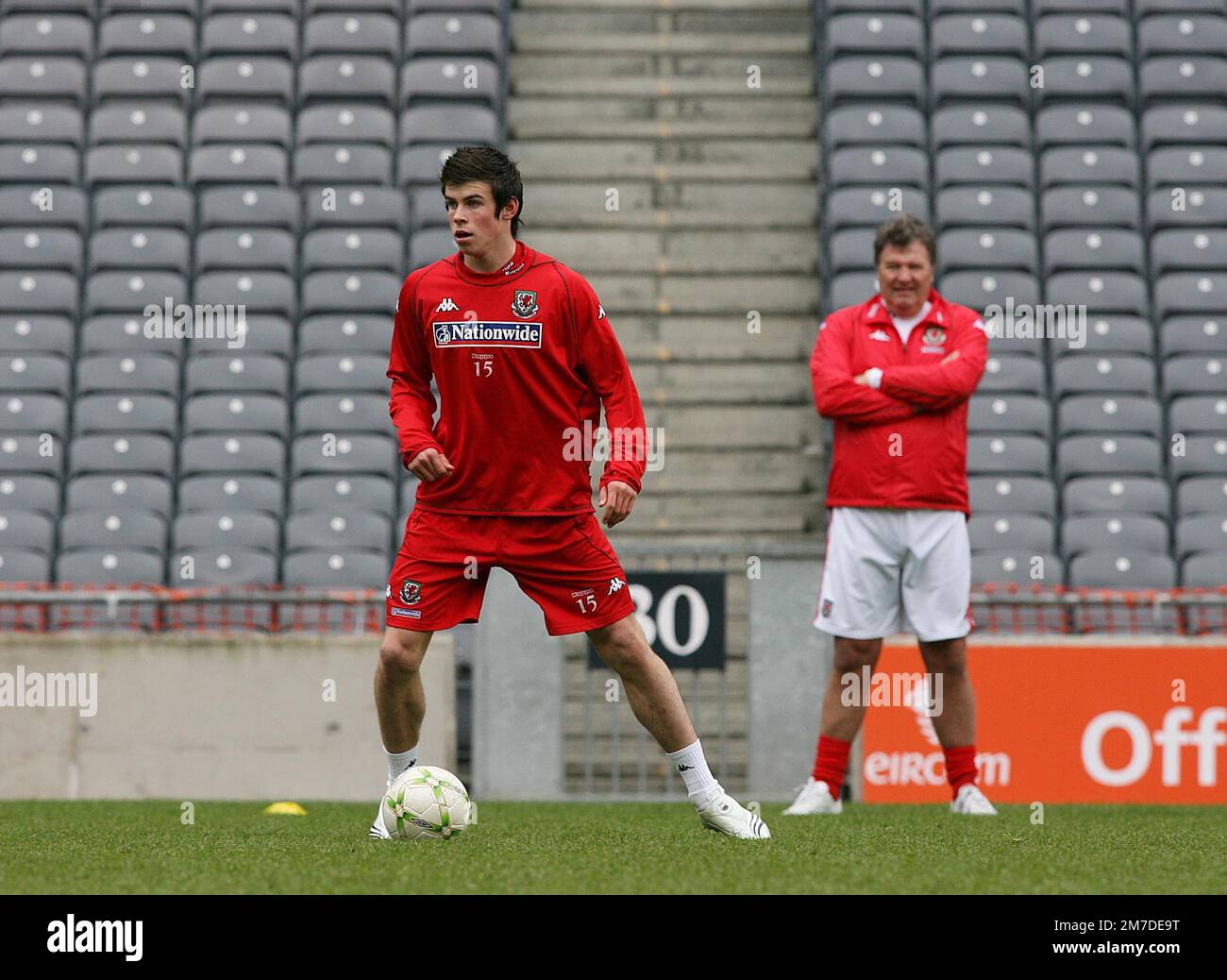 File photo dated 23-03-2007 of Wales' Gareth Bale watched by Manager ...