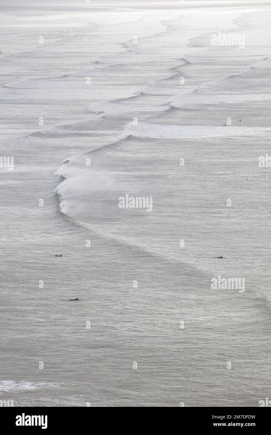 Lines of surf or swell enter the bay at Saunton sands Devon where ...