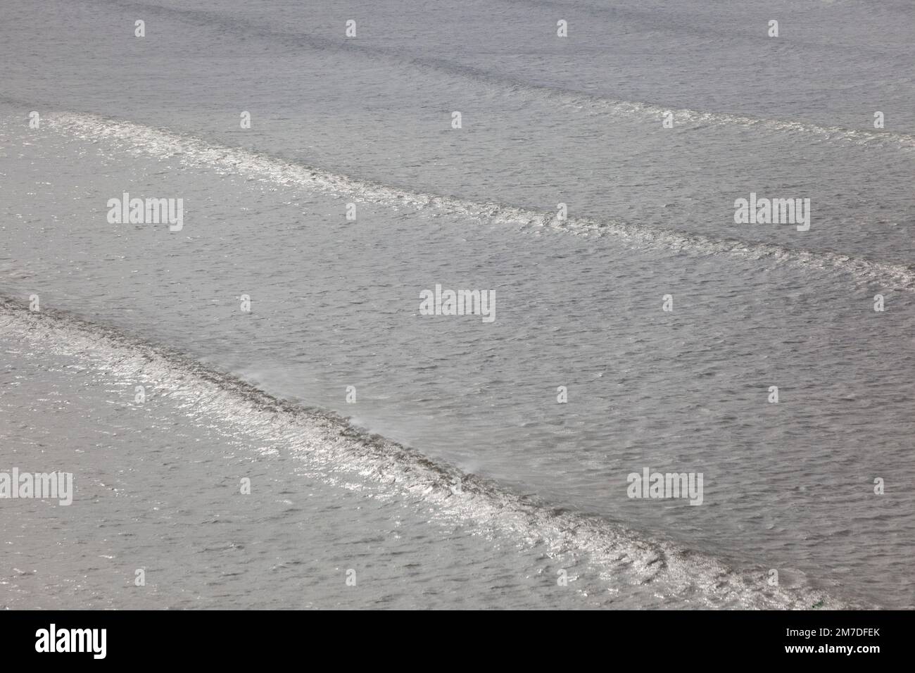 Lines of surf or swell enter the bay at Saunton sands Devon where ...