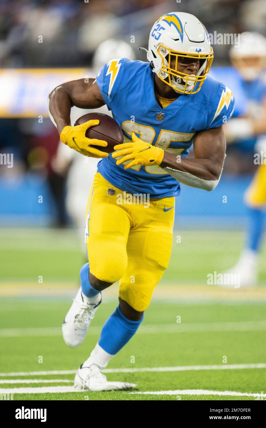 Los Angeles Chargers running back Joshua Kelley (25) runs with the ball ...