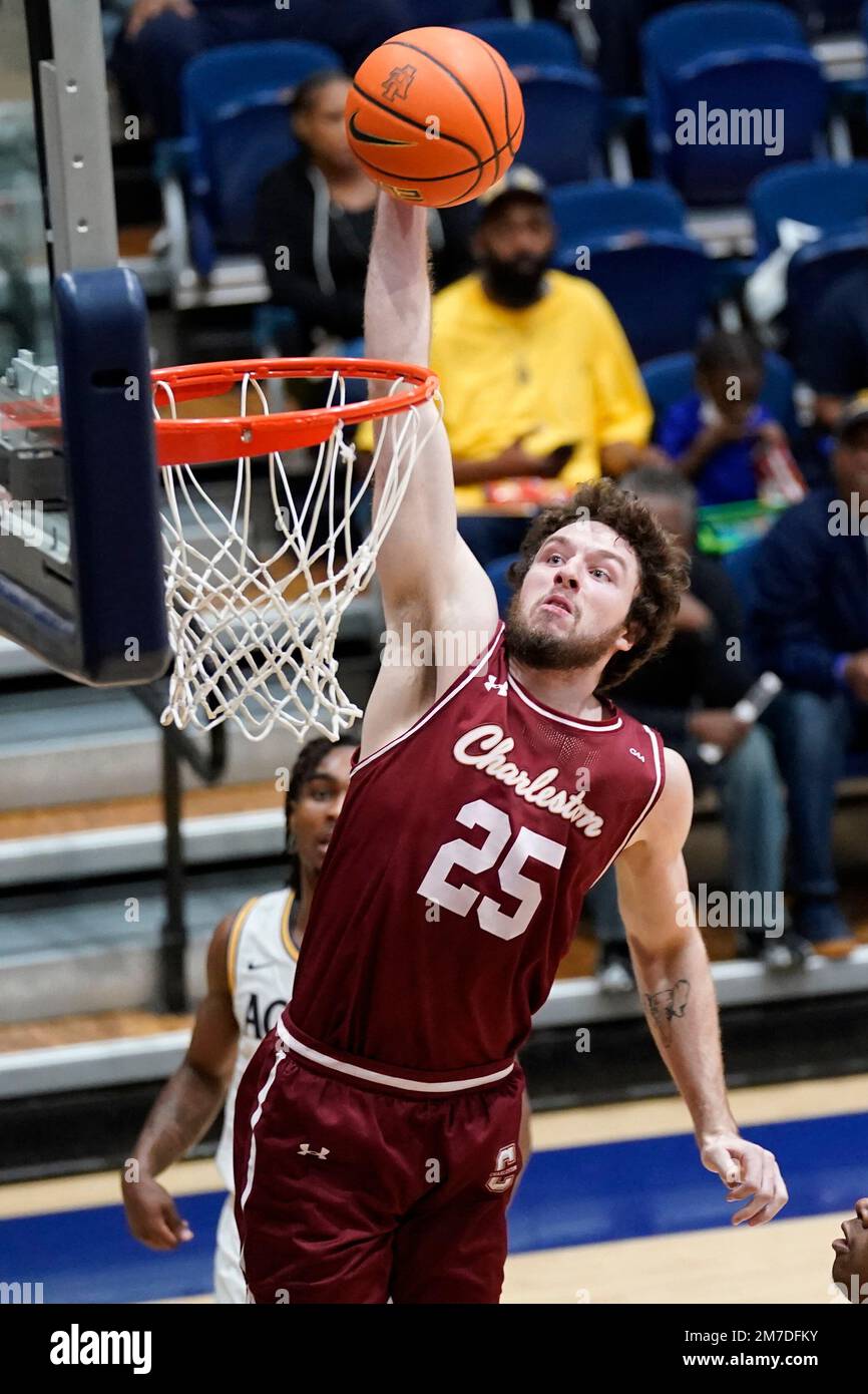 College of Charleston forward Ben Burnham (25) goes up to dunk against ...