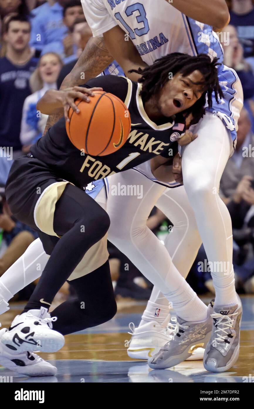 Wake Forest guard Tyree Appleby (1) reacts as he collides with North ...