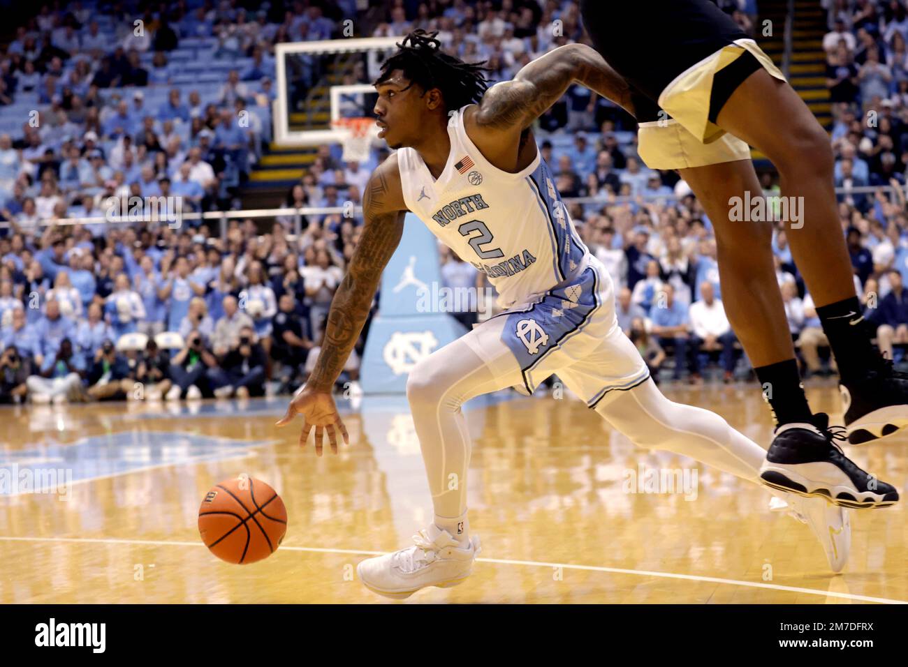 North Carolina guard Caleb Love (2) drives against Wake Forest during ...