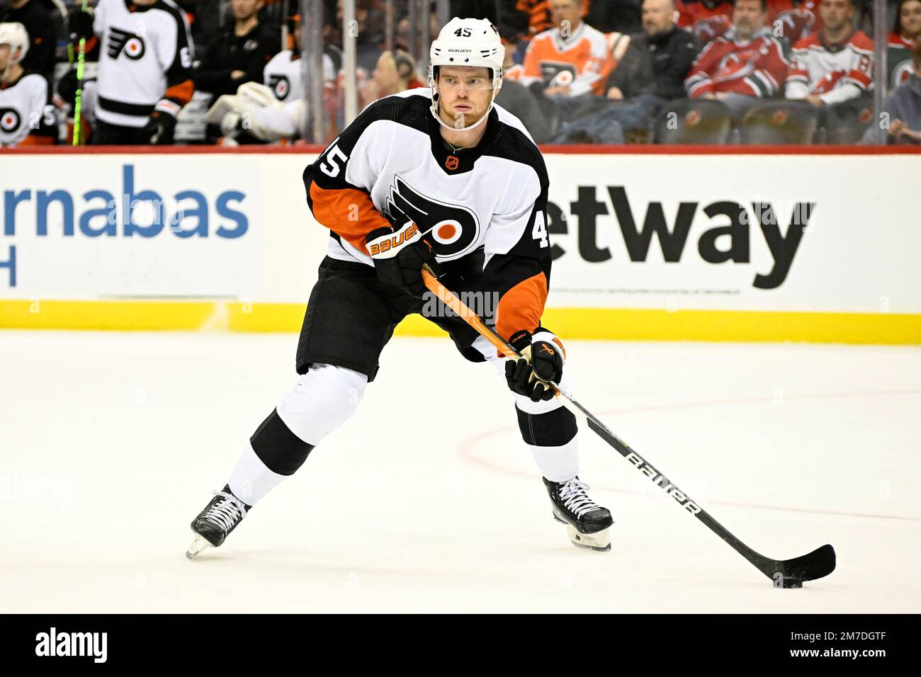 Philadelphia Flyers defenseman Cam York (45) looks to pass the puck ...