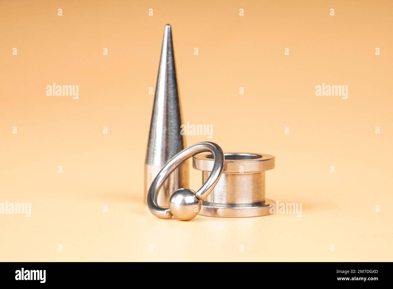 piercing set, metal accessories for piercing the skin of the ears Stock ...