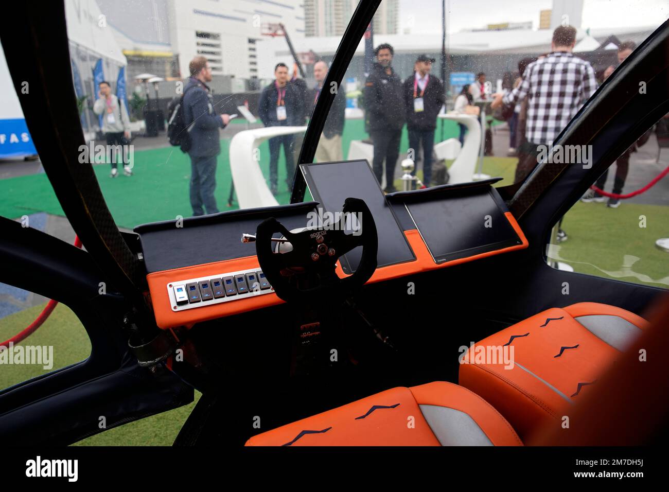 People view a functional prototype of the ASKA A5 VTOL flying car during the CES tech show ...