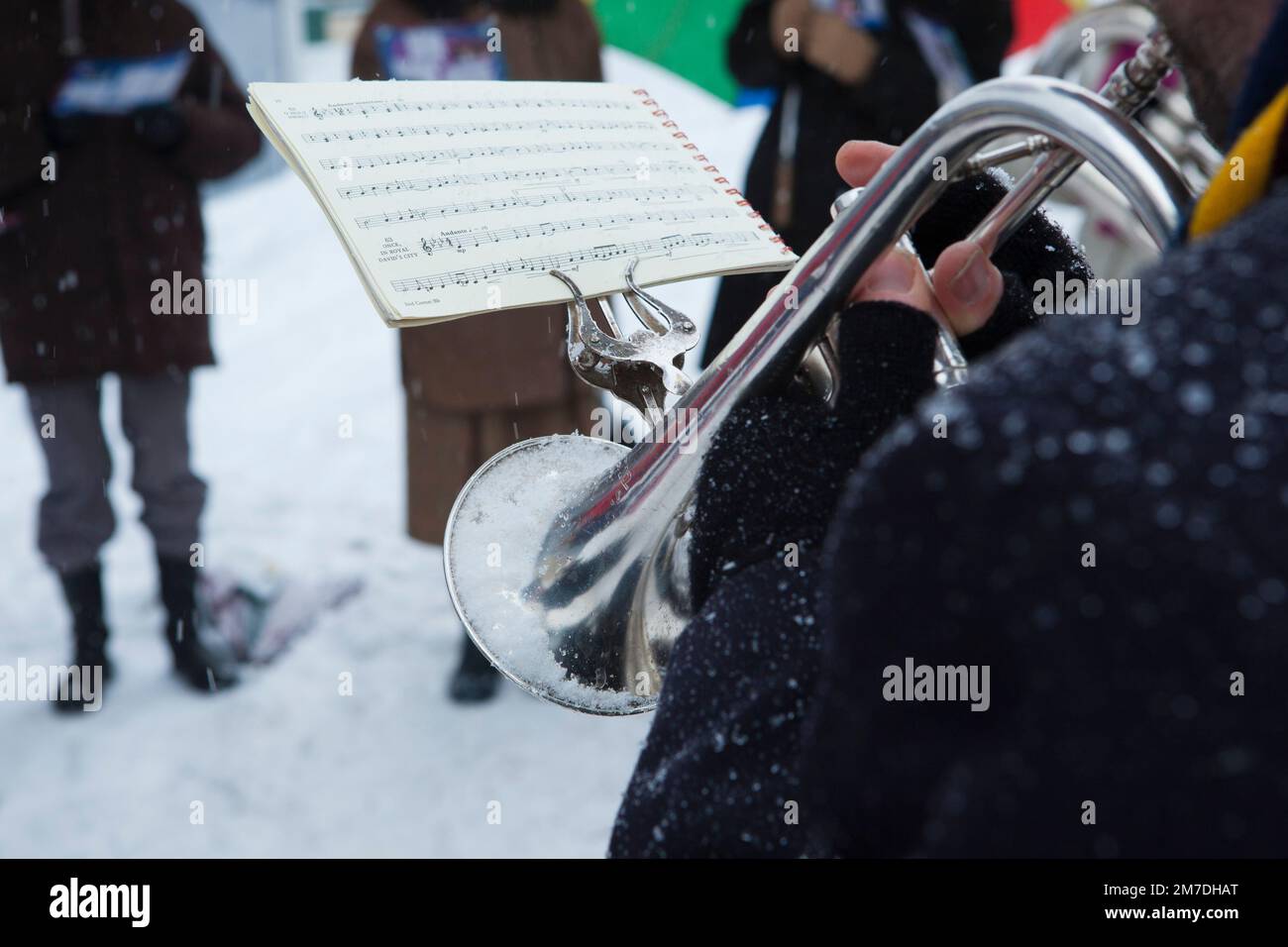 Salvation army band playing carols in a cotswold market place as ...