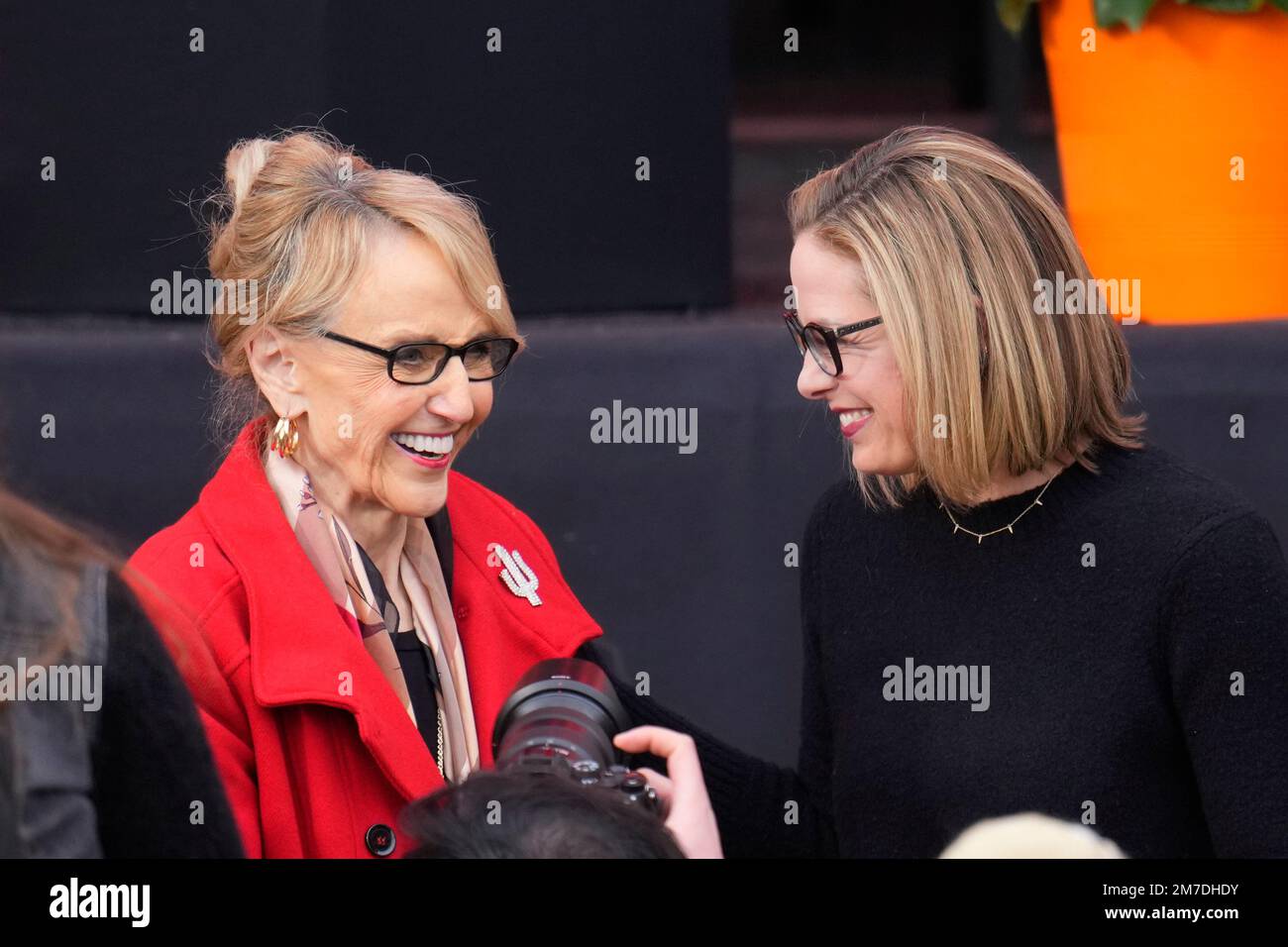 U.S. Sen. Kyrsten Sinema, I-Ariz., right, talks with former Arizona ...