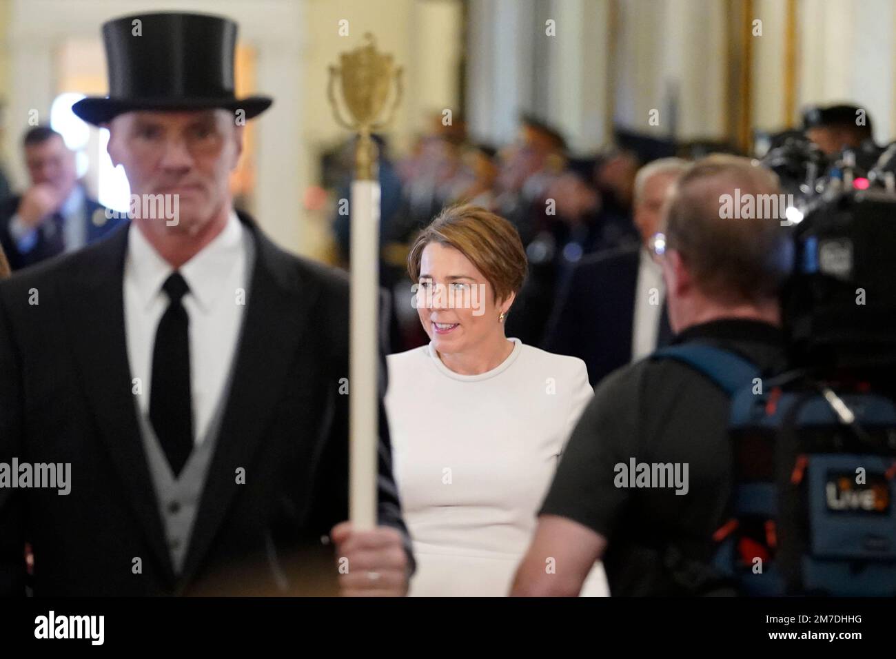 Maura Healey, center, walks toward the House Chamber at the Statehouse ...