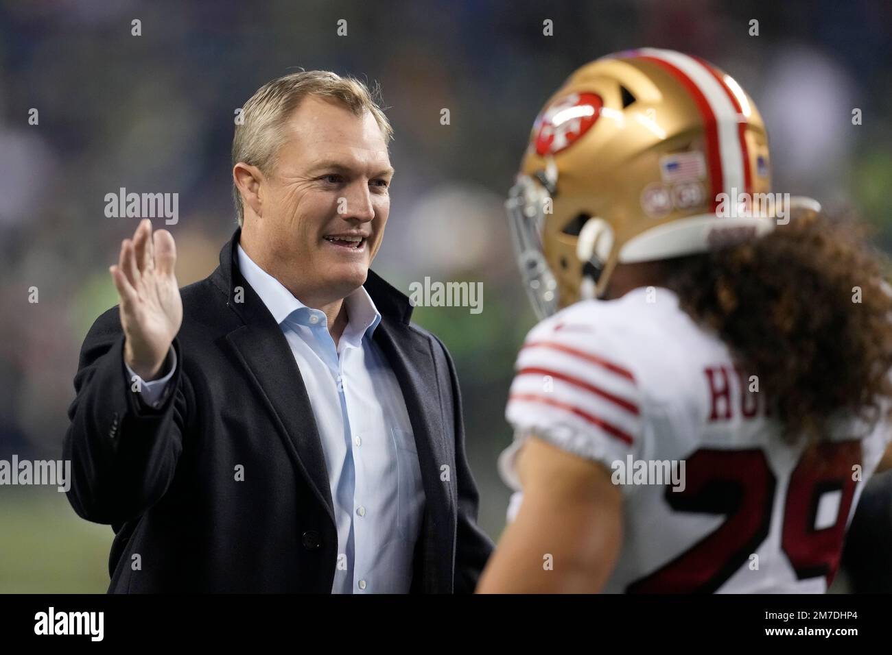 San Francisco 49ers general manager John Lynch, left, greets safety ...