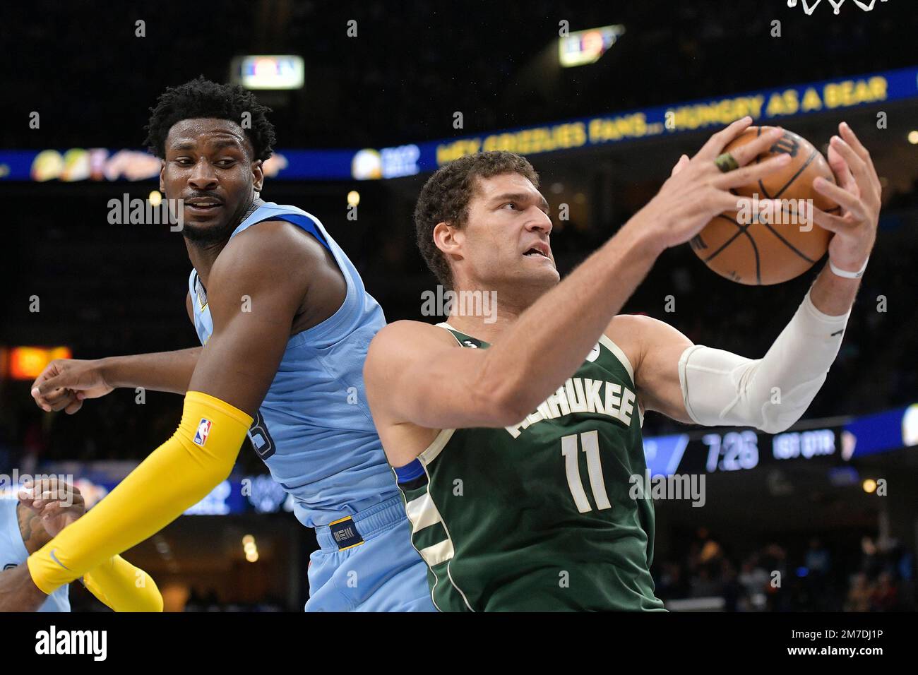 Milwaukee Bucks center Brook Lopez (11) handles the ball ahead of ...