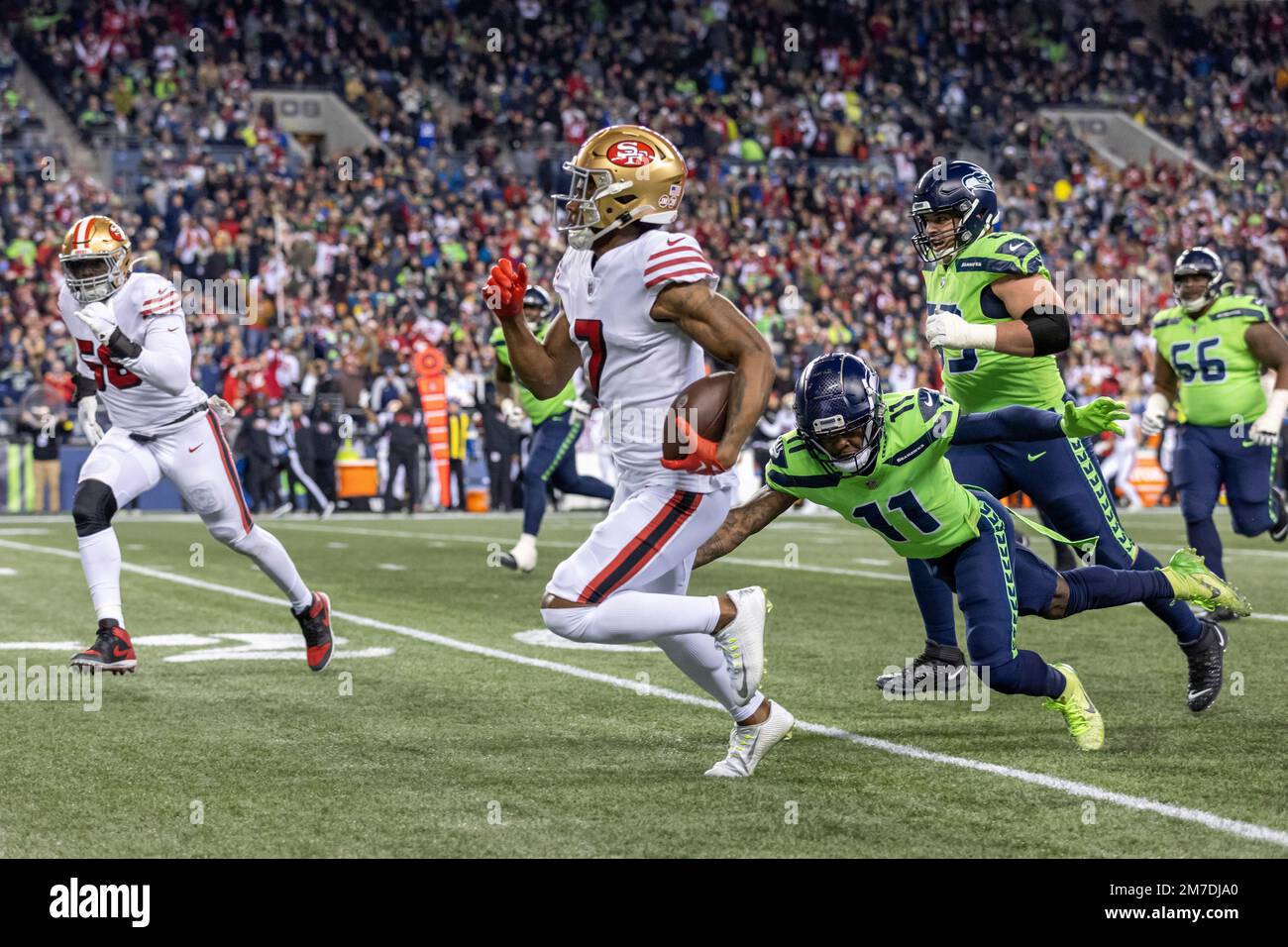 San Francisco 49ers cornerback Charvarius Ward (7) recovers a fumble ...