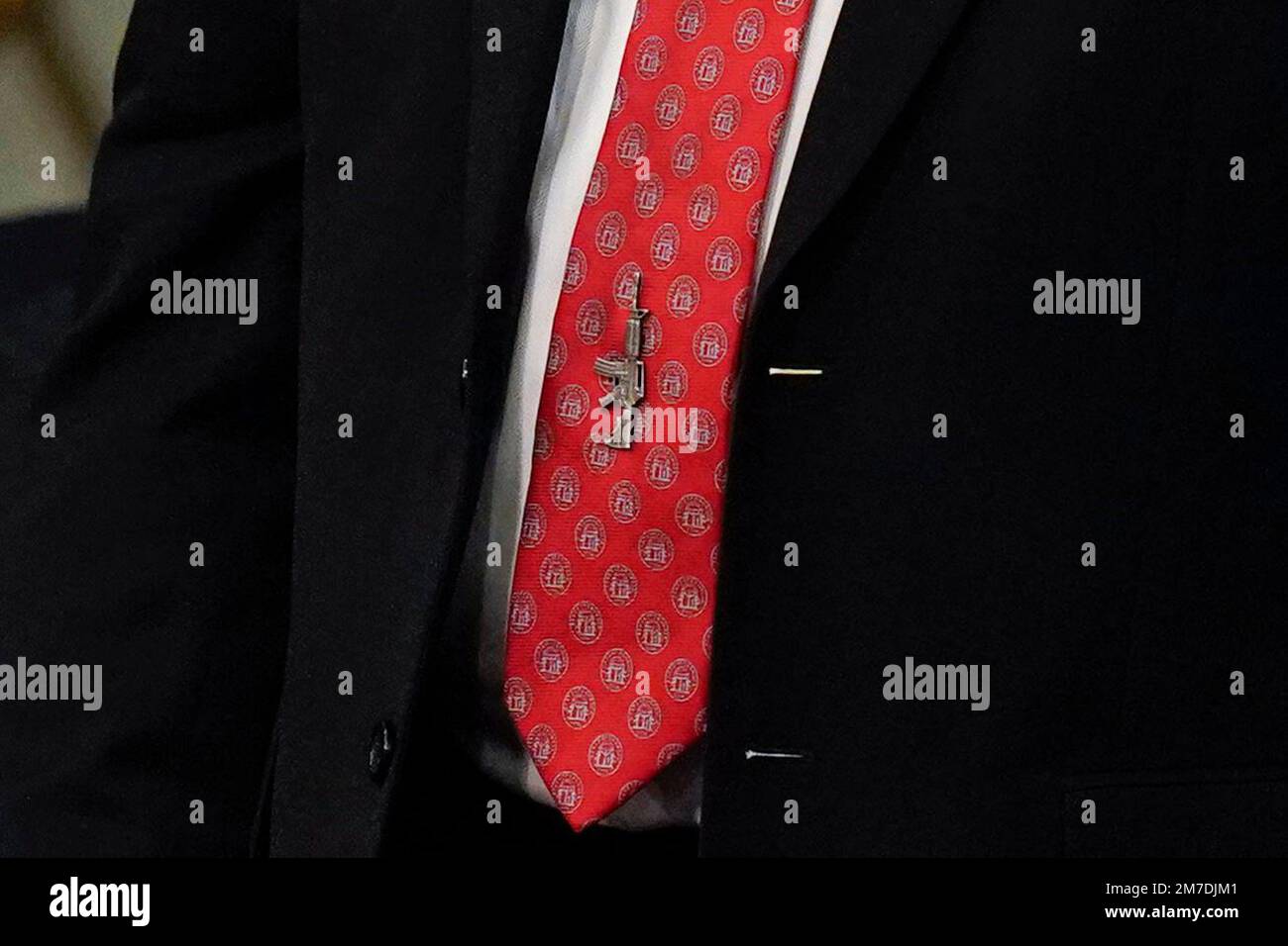 Rep. Andrew Clyde, R-Ga., wears an AR-15 tie tack as he votes for the ...