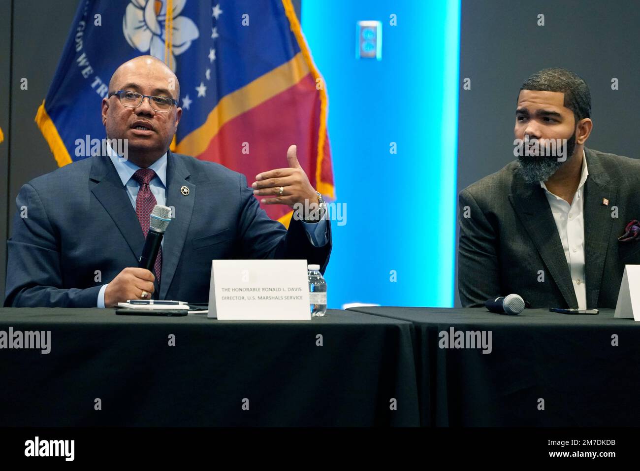 U. S. Marshals Service Director Ronald L. Davis, left, discusses his ...