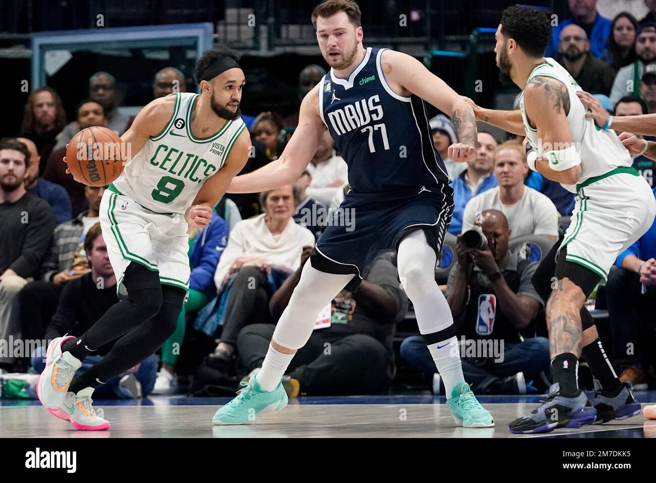 Boston Celtics guard Derrick White (9) drives against Dallas Mavericks ...