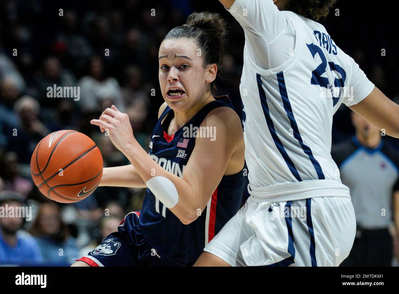 UConn forward Lou Lopez Senechal (11) drives against Xavier's Aanaya ...