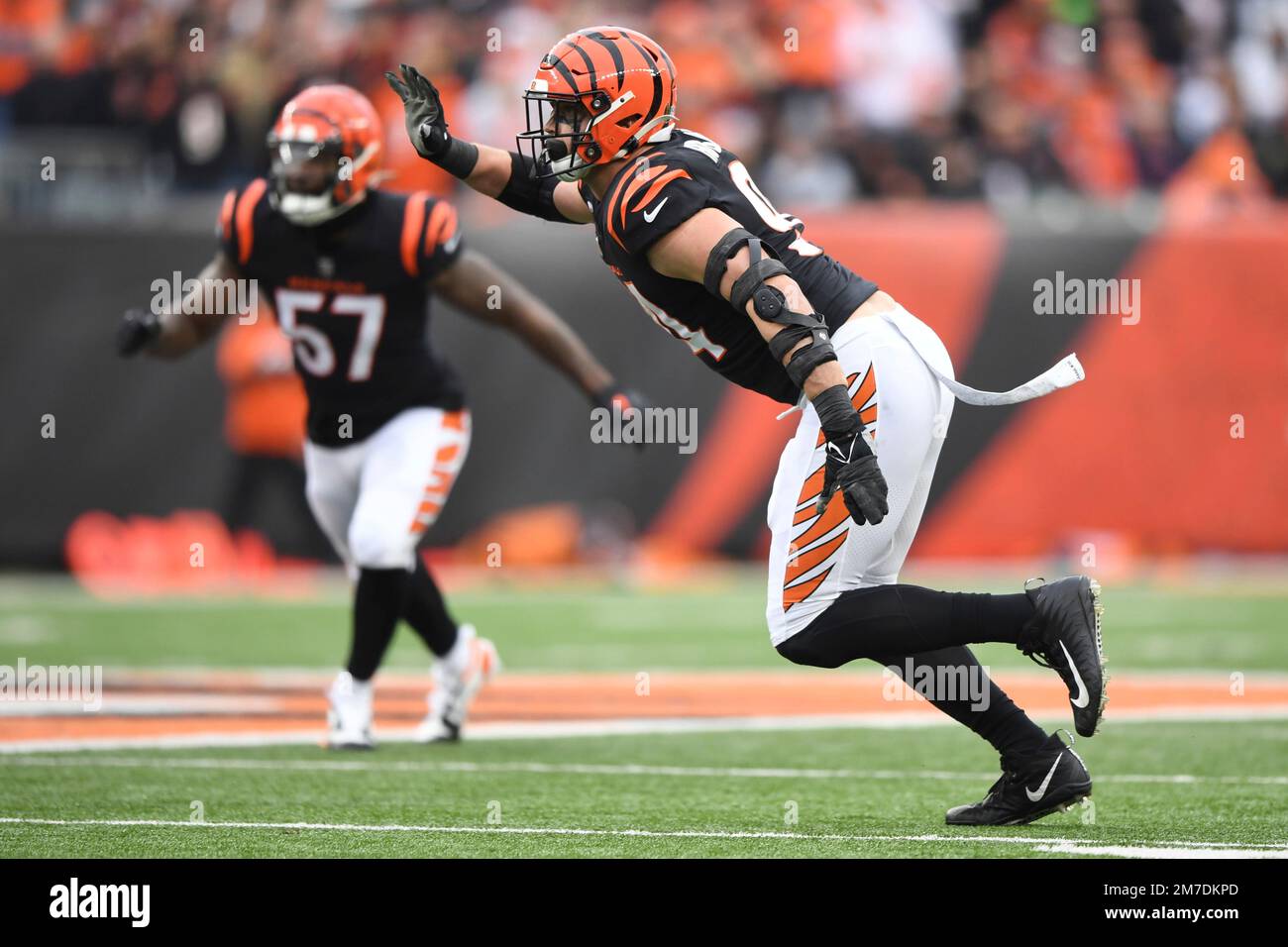 Cincinnati Bengals defensive end Sam Hubbard (94) runs for the play ...