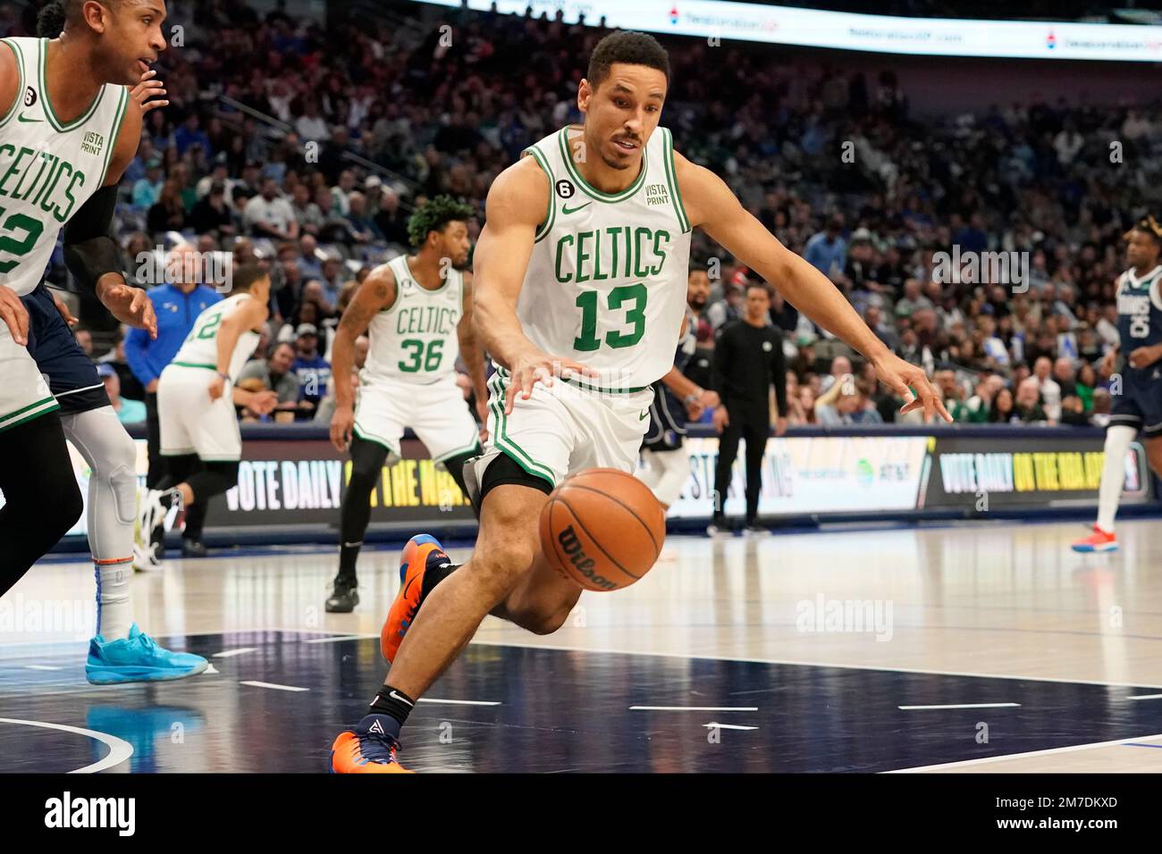 Boston Celtics guard Malcolm Brogdon (13) dribbles during the first ...