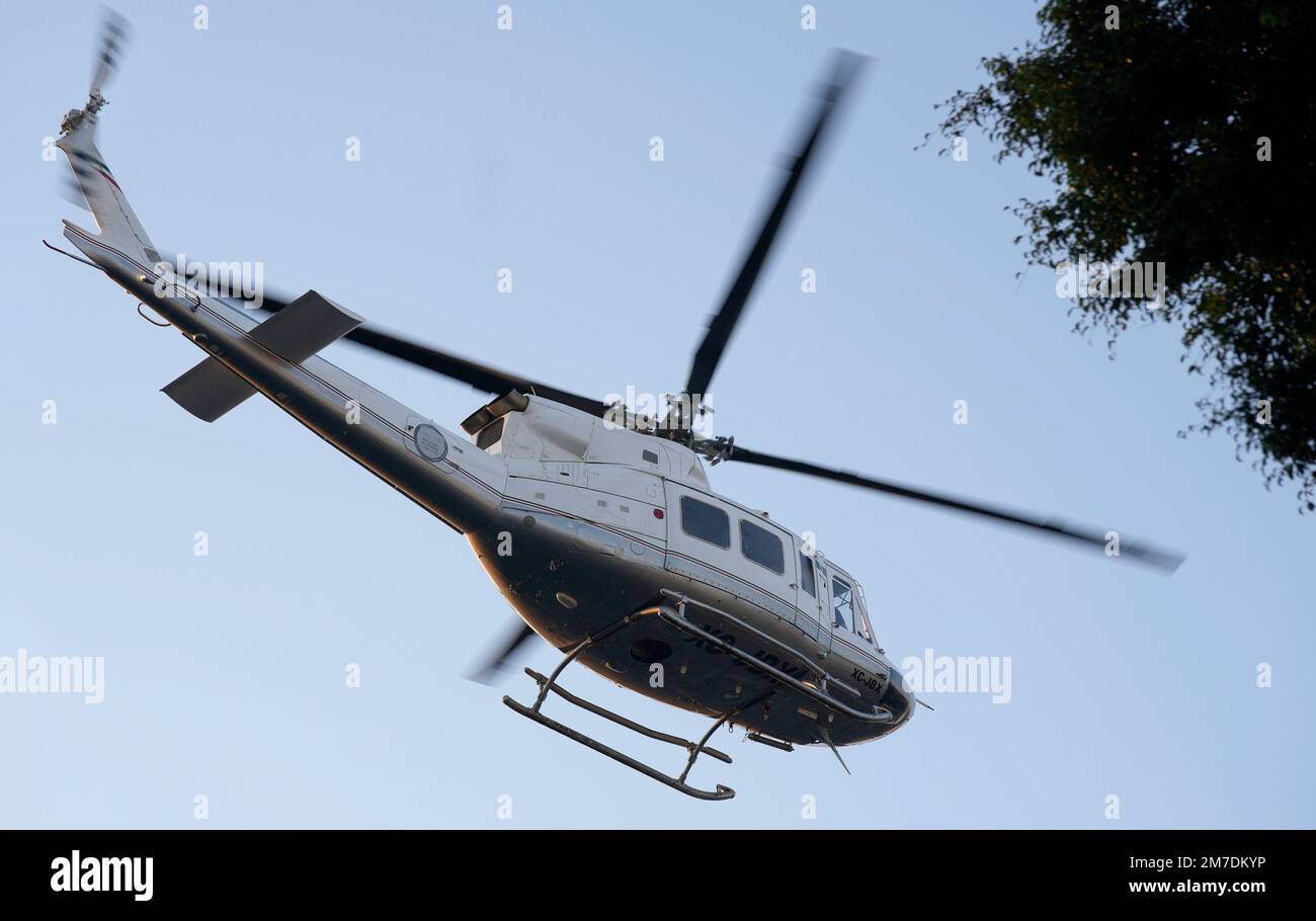 A government helicopter takes off from the prosecutor's building where ...