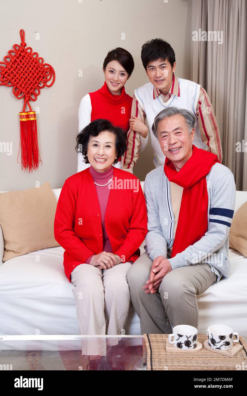 Young chinese family standing hi-res stock photography and images - Alamy