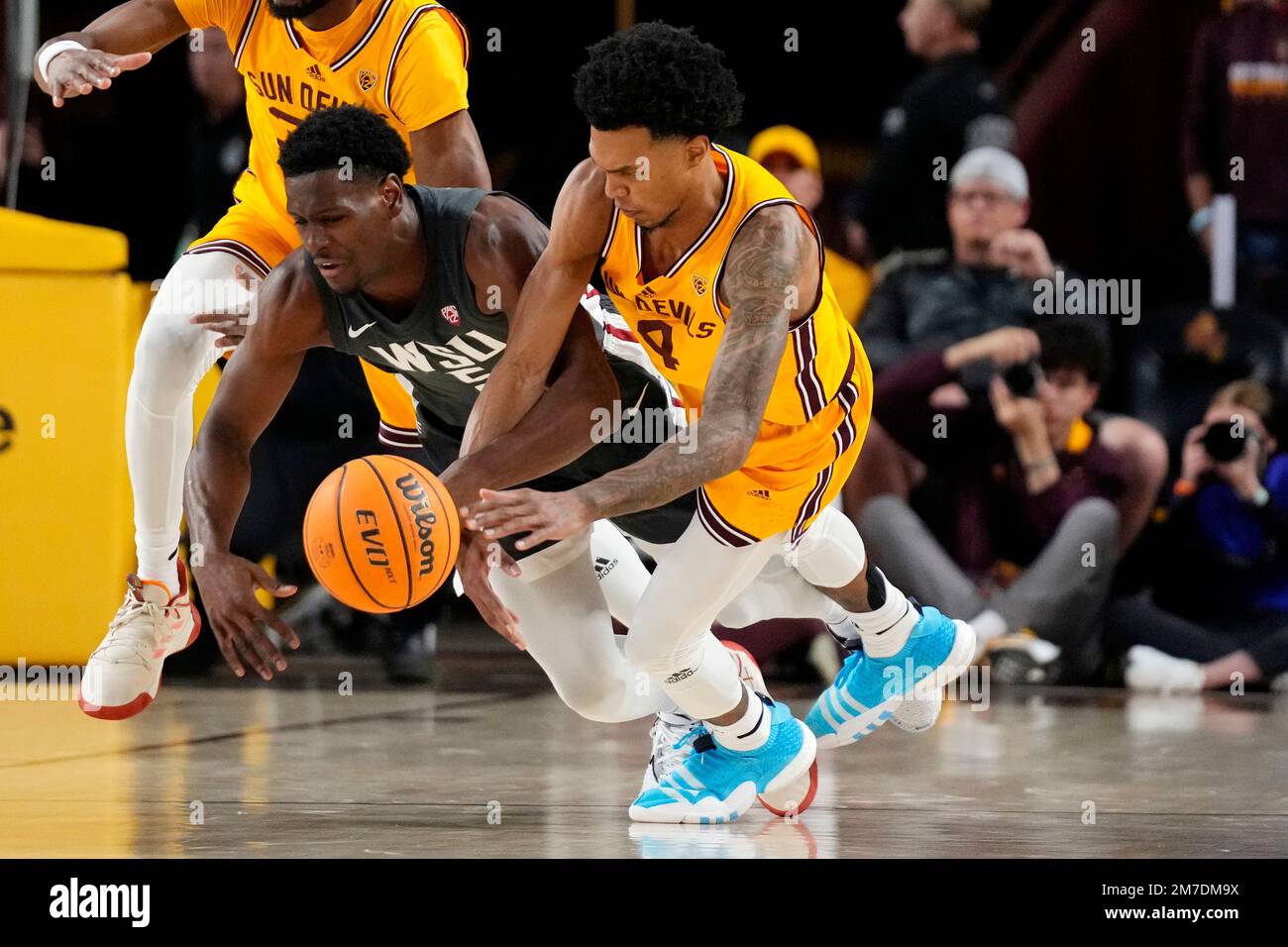 Arizona State guard Desmond Cambridge Jr., right, and Washington State ...