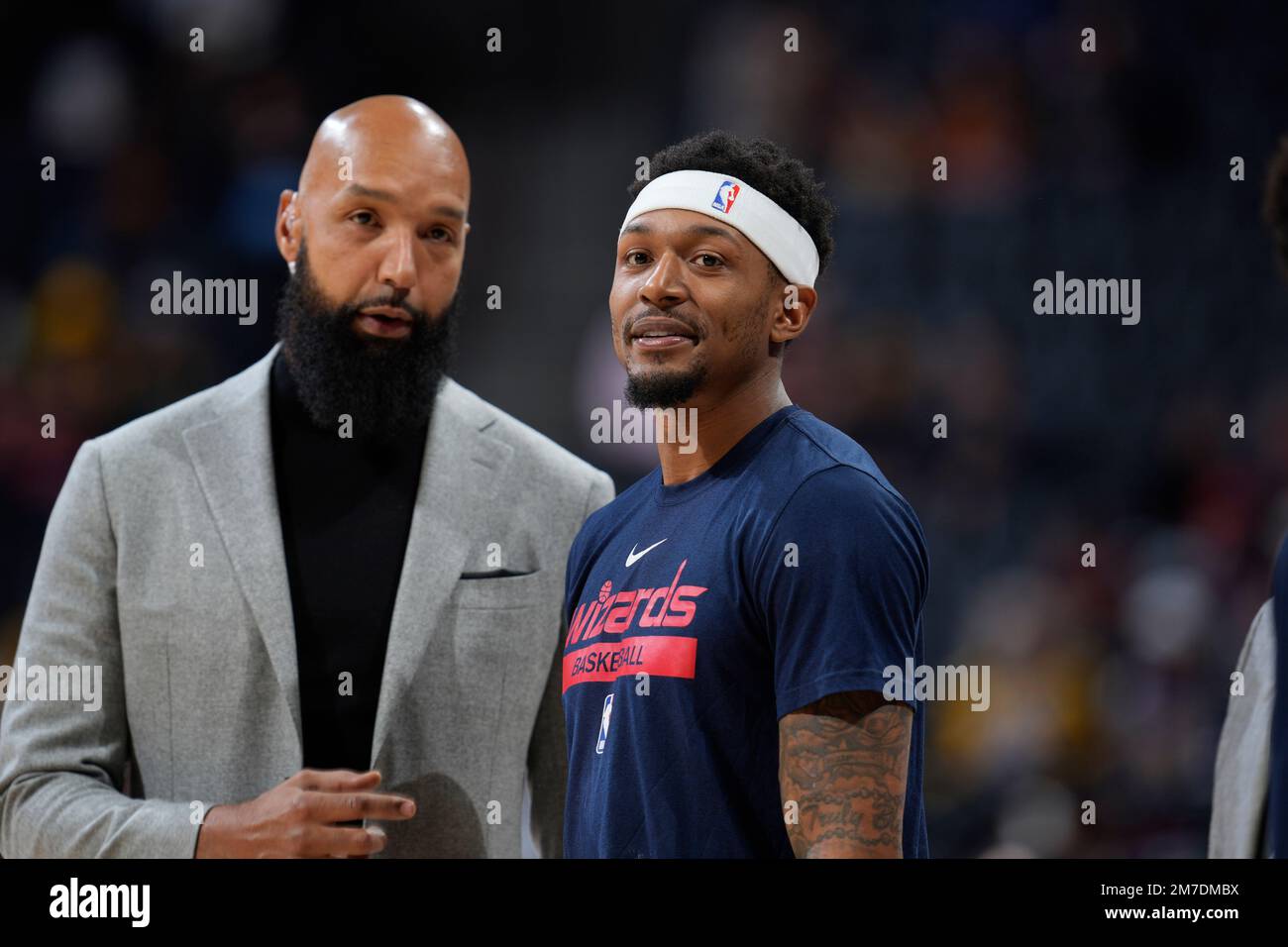 Washington Wizards guard Bradley Beal (3) chats with television color ...