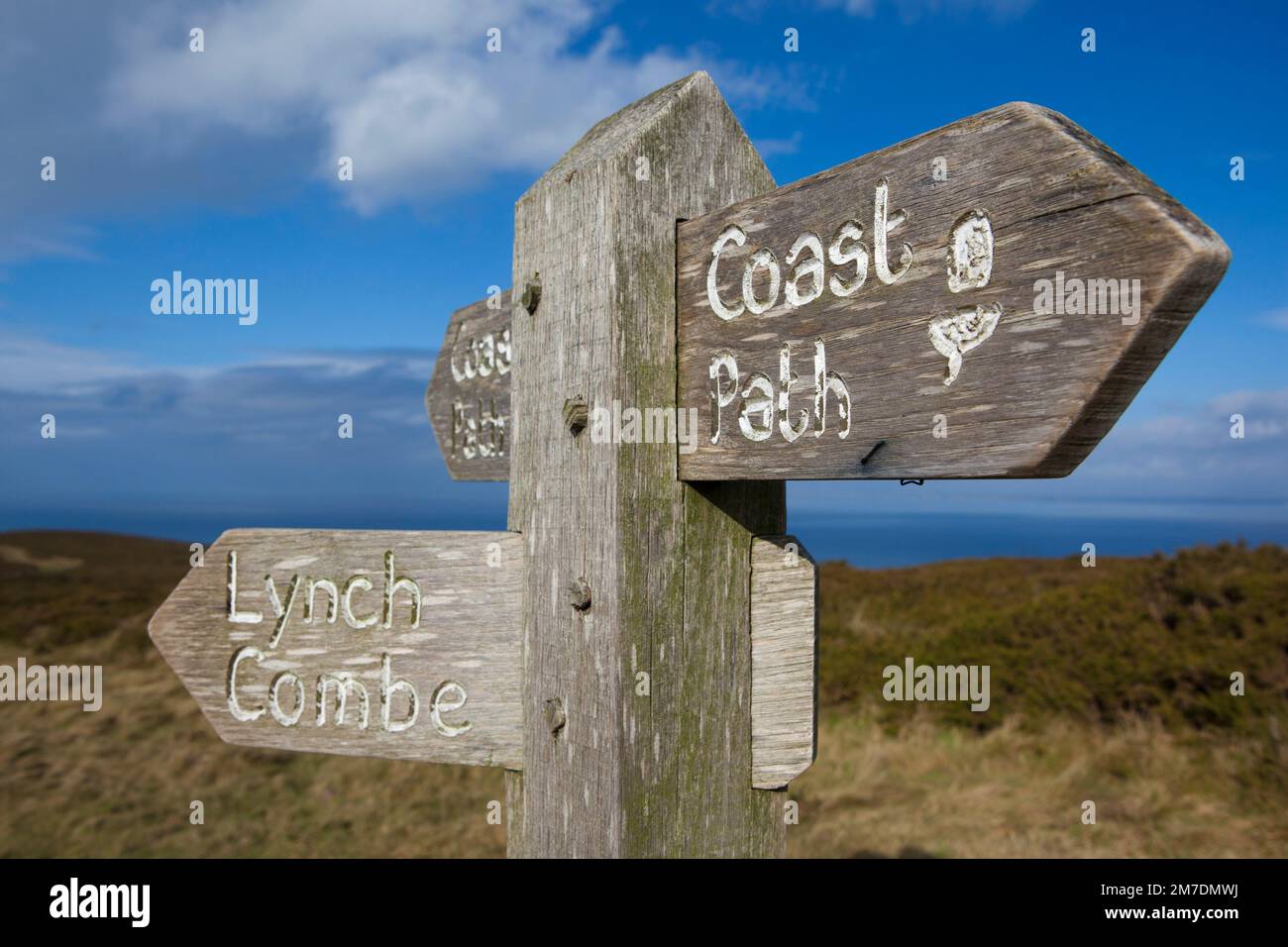 An old wooden sign post on the top of a hill on the south west coastal ...