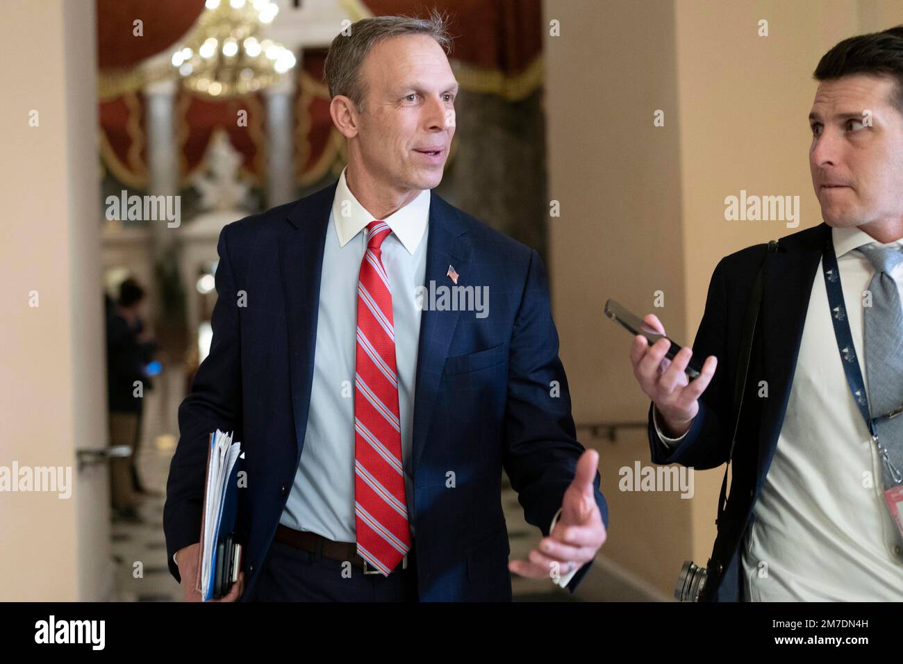 Rep. Scott Perry, R-Pa., talks to reporters as he walks to the House ...