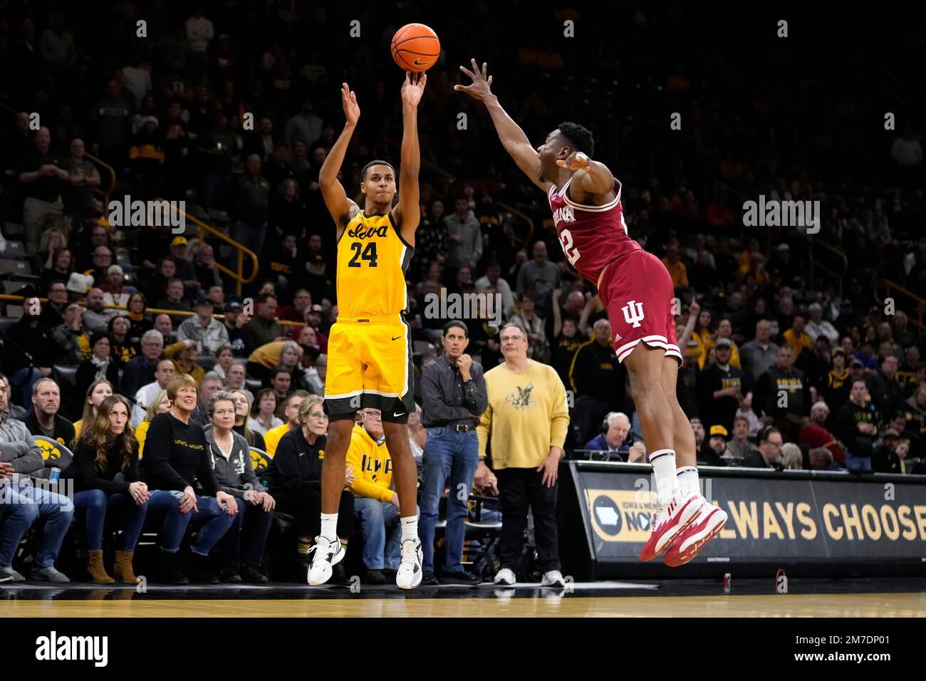 Iowa forward Kris Murray (24) shoots a 3-point basket ahead of Indiana ...