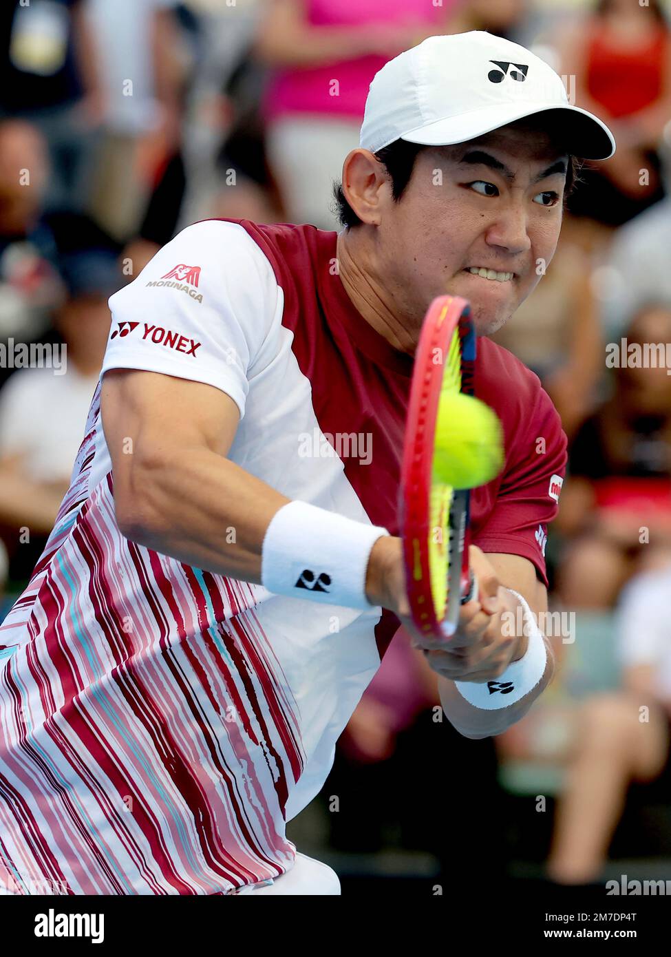 Japan's Yoshihito Nishioka makes a backhand return to Australia's Alexei Papyri during their ...