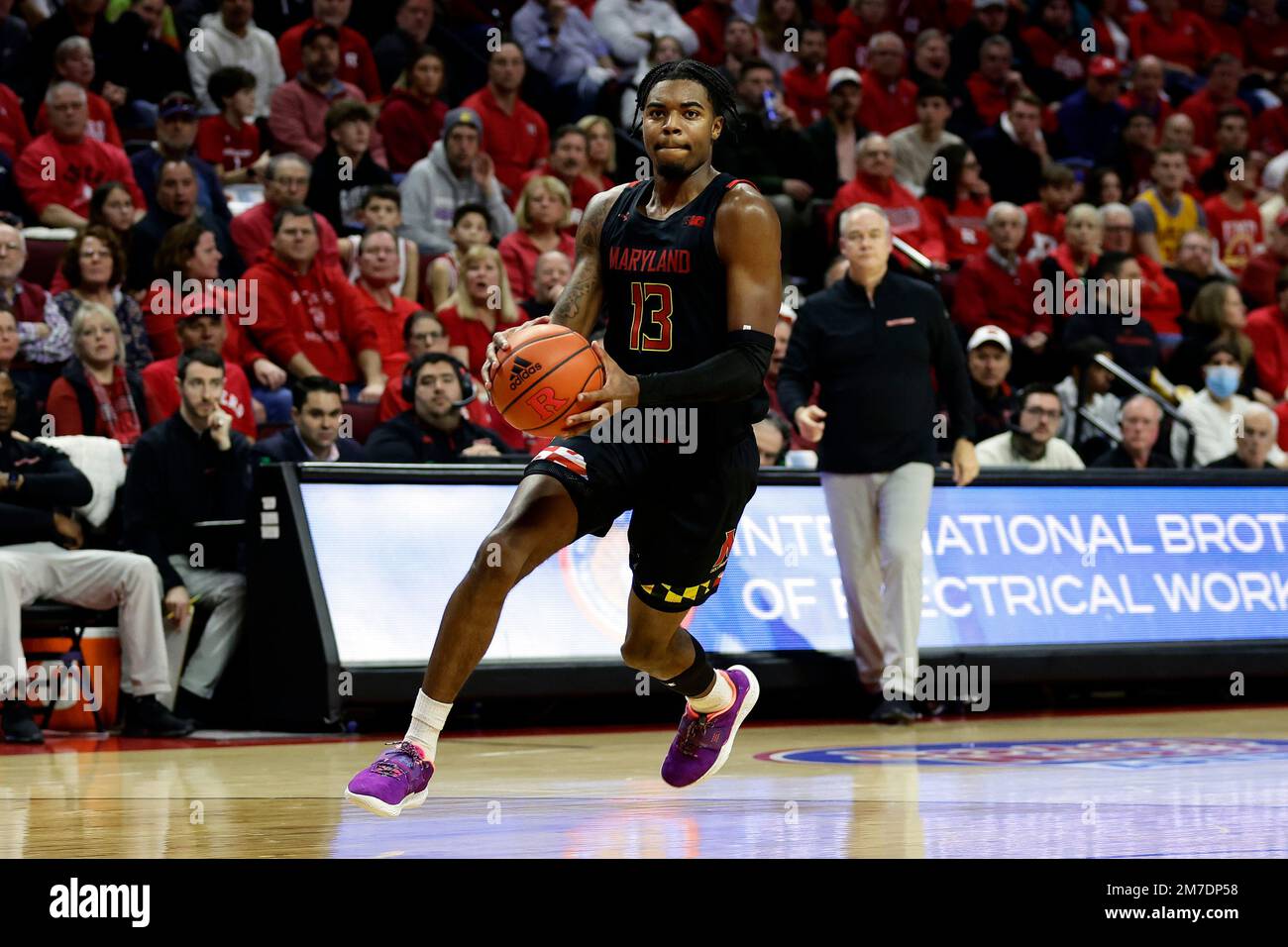 Maryland guard Hakim Hart (13) drives to the basket against Rutgers ...