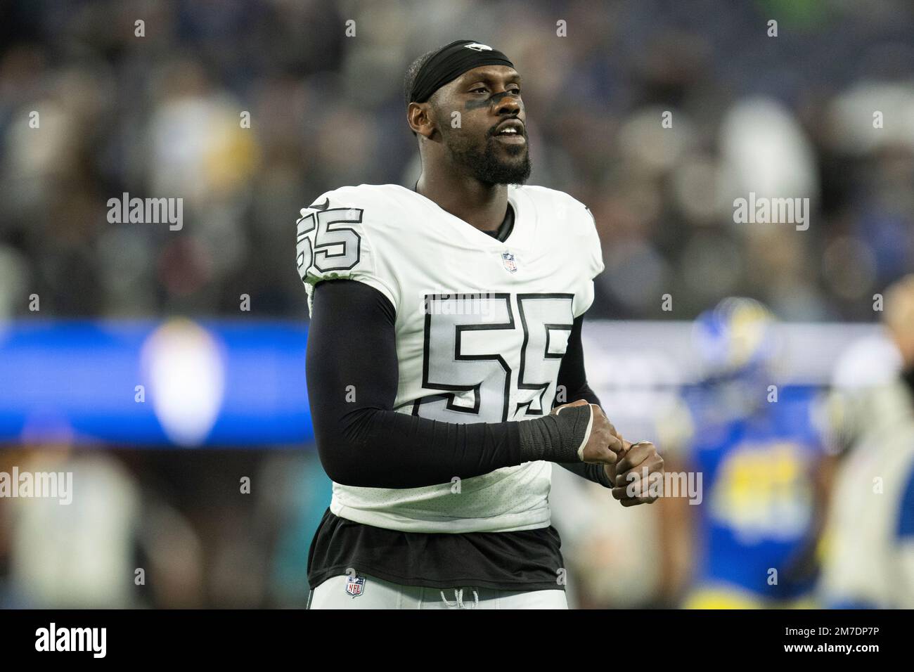 Las Vegas Raiders defensive end Chandler Jones (55) walks on the field ...
