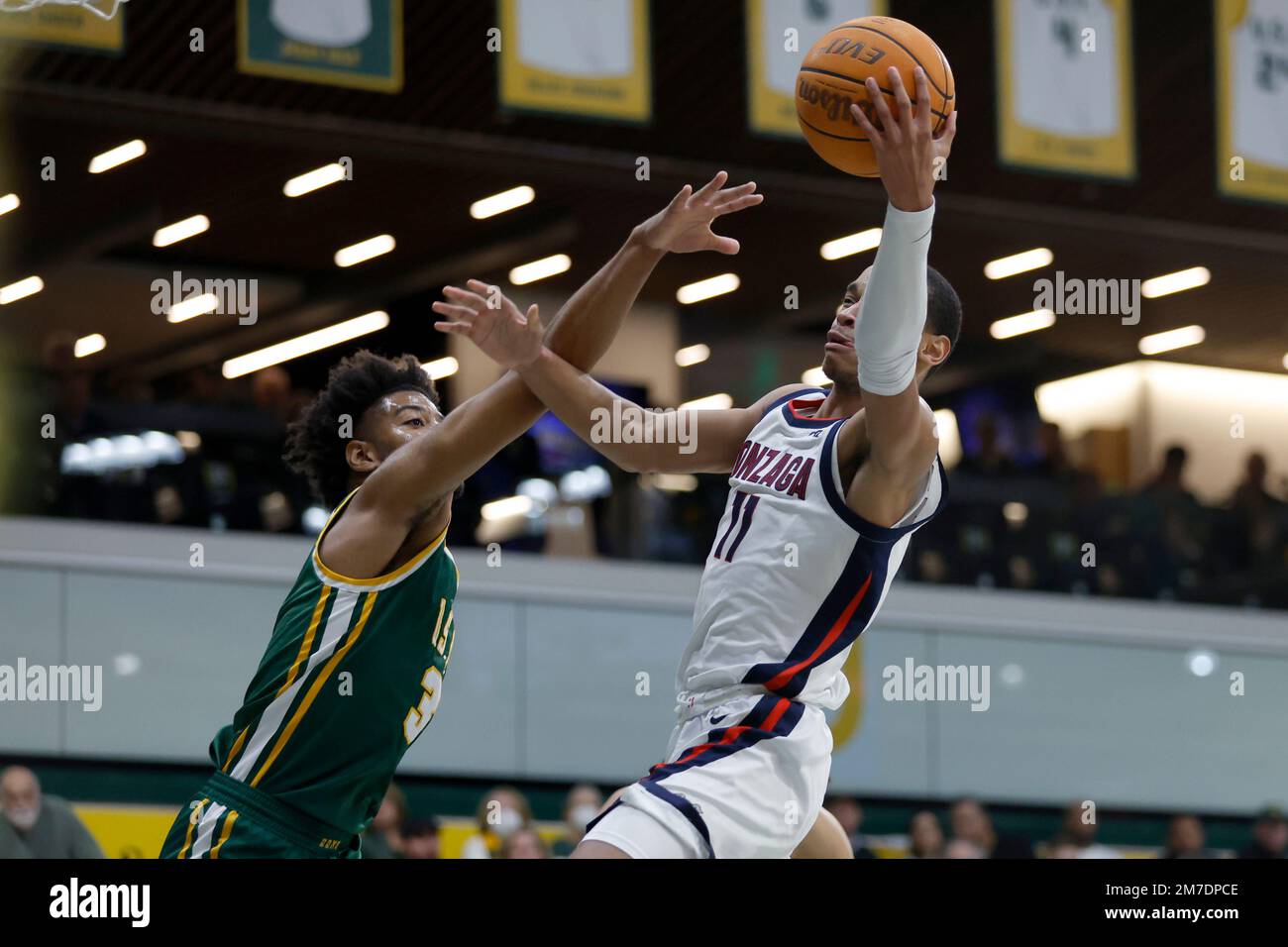 Gonzaga guard Nolan Hickman (11) shoots against San Francisco forward ...