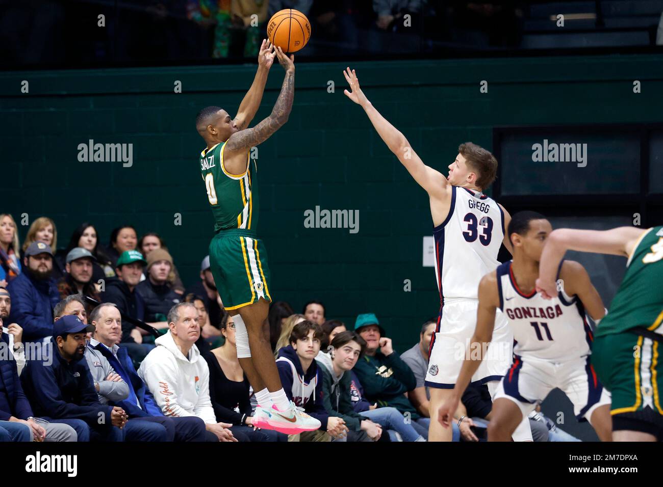 San Francisco guard Khalil Shabazz (0) shoots against Gonzaga forward ...