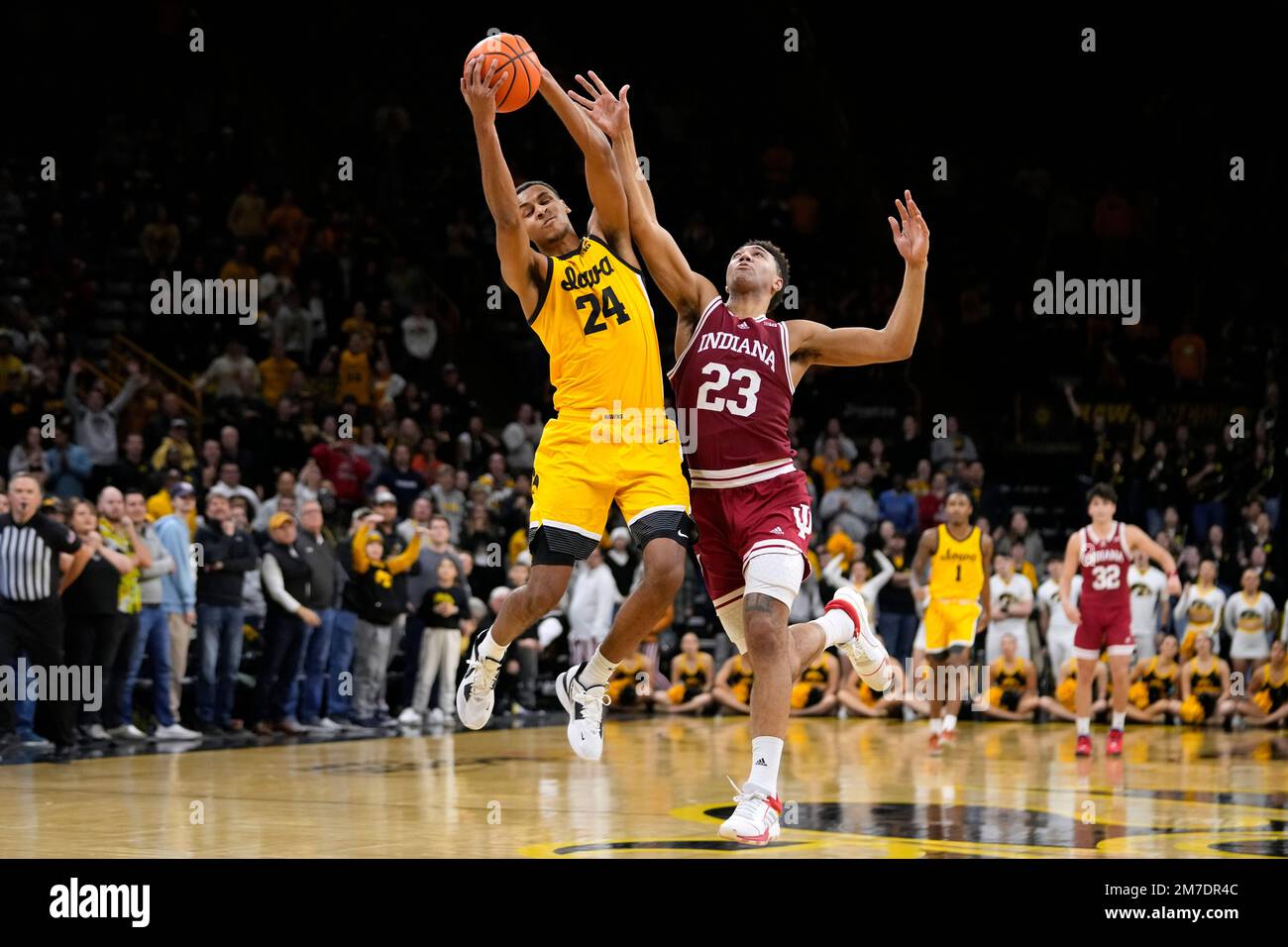 Iowa forward Kris Murray (24) catches a pass over Indiana forward ...