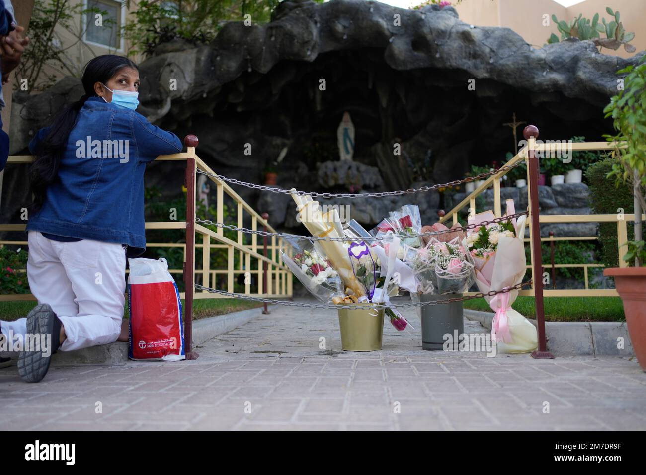 People pray outside the Catholic Church, Our Lady of the Rosary, at the ...