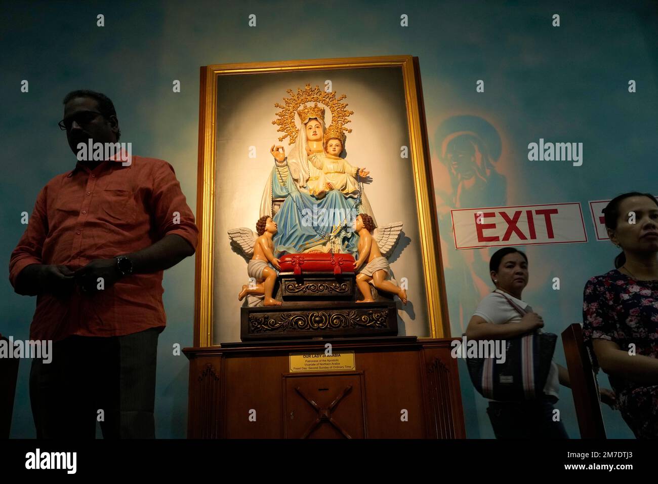 People take part in a liturgy at the Catholic Church, Our Lady of the ...