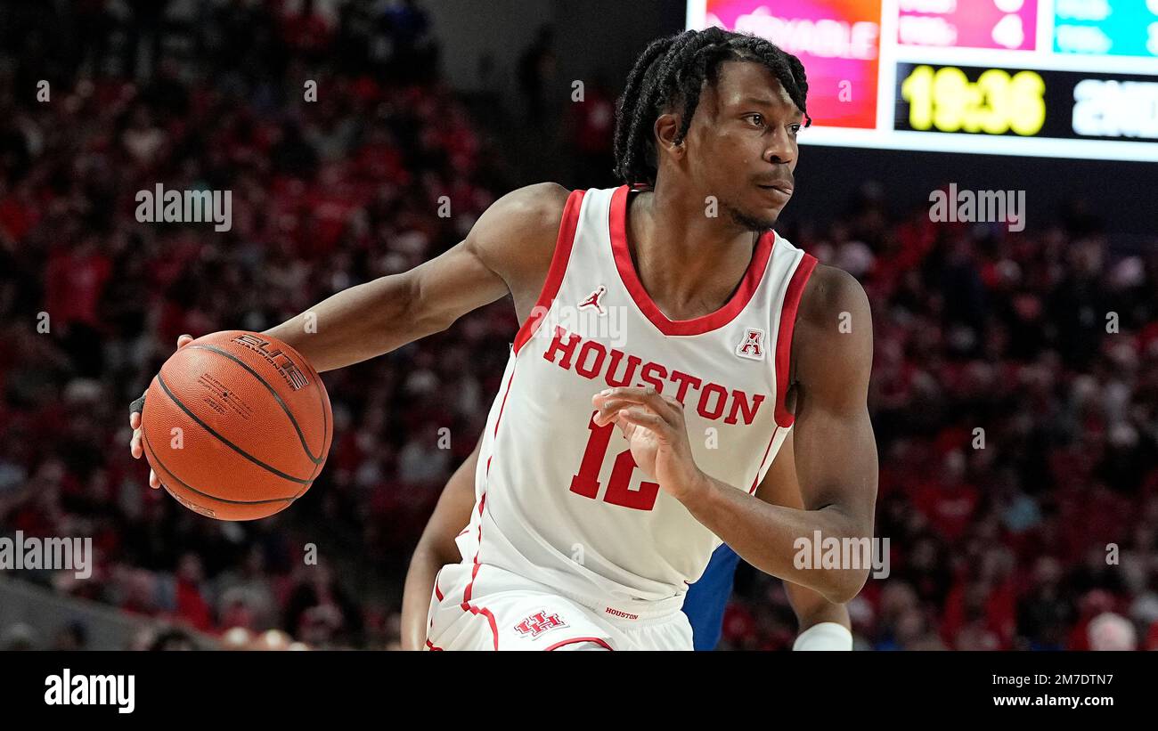 Houston guard Tramon Mark (12) advances the ball during the second half ...