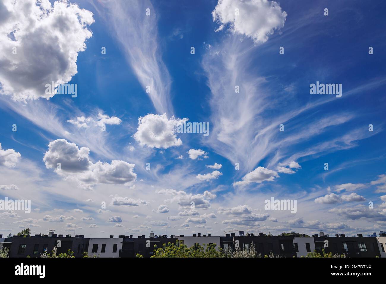 Summer blue sky with white clouds in Warsaw city, Poland Stock Photo ...