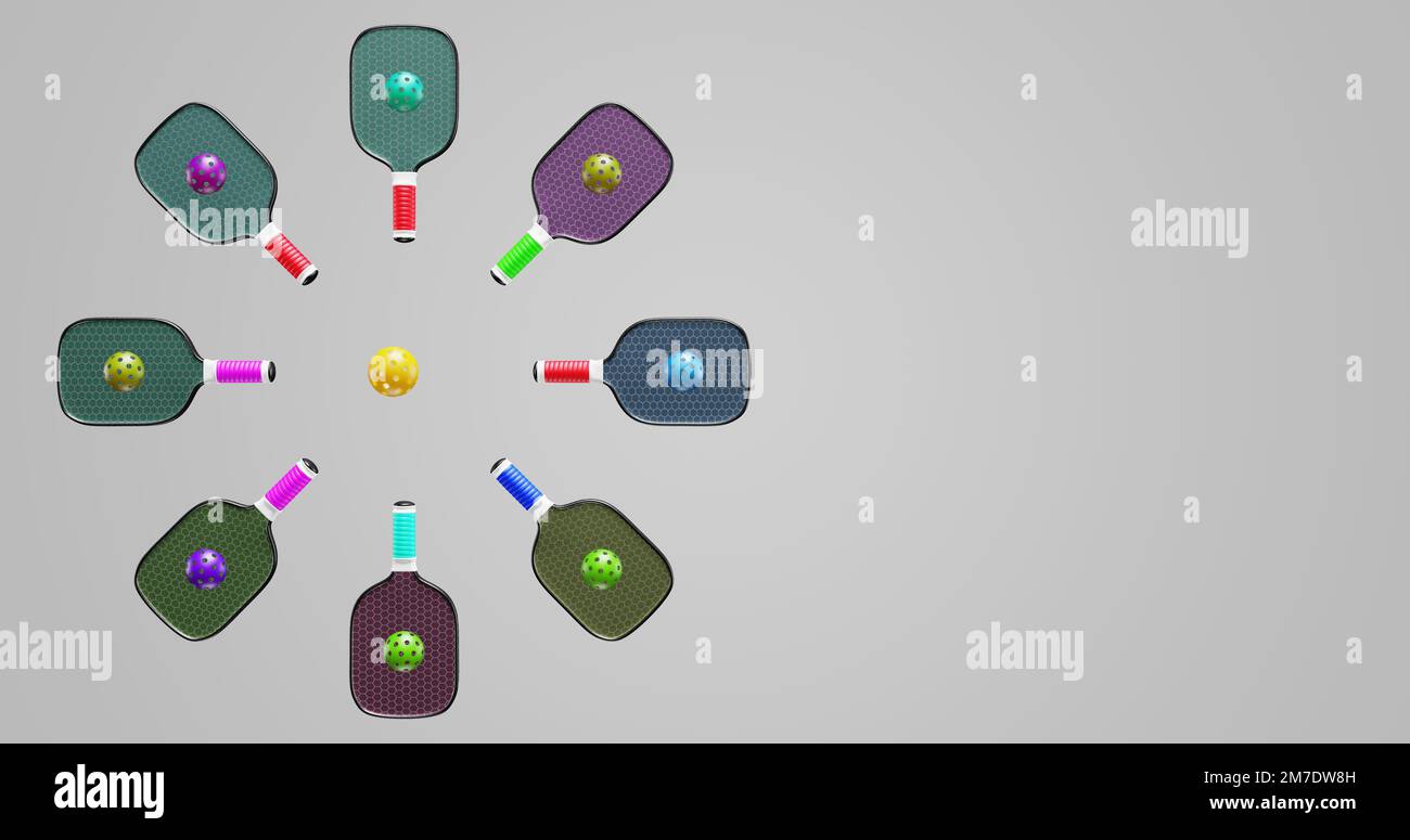 Pickleball circle made of colorful rackets and balls for playing on a ...