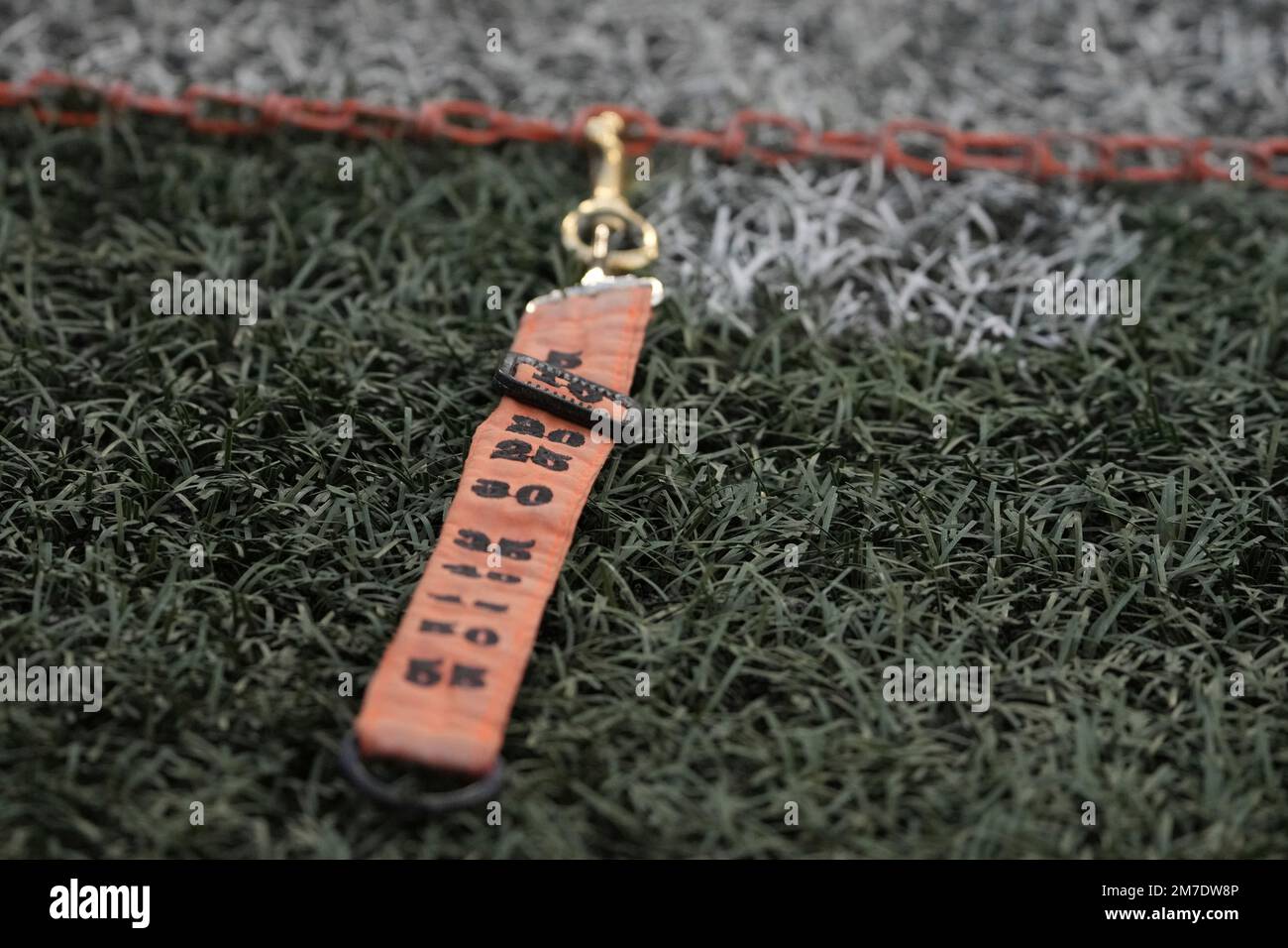 A yard marker is shown on the first down chain during an NFL football ...