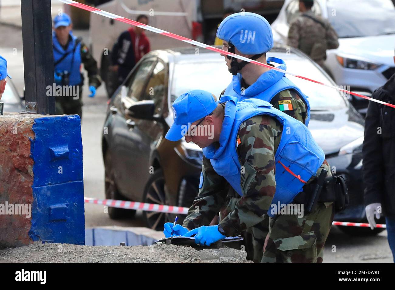 Irish UN peacekeepers investigate at the scene where unidentified open ...