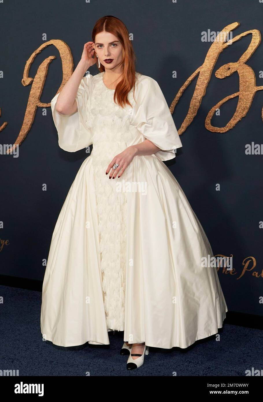 Lucy Boynton poses at the premiere of the film "The Pale Blue Eye ...