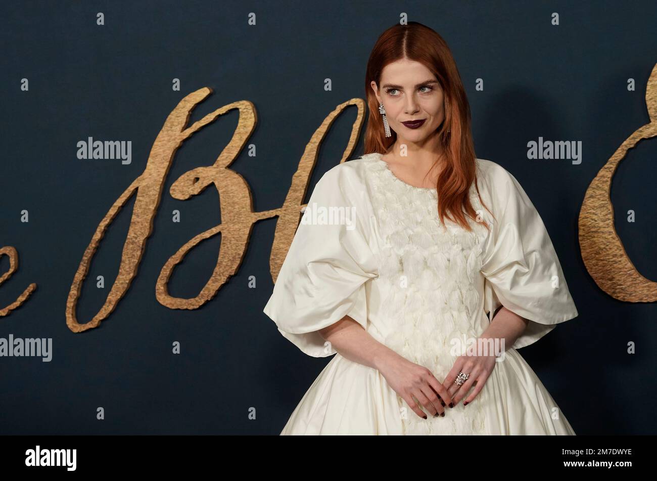 Lucy Boynton poses at the premiere of the film "The Pale Blue Eye ...