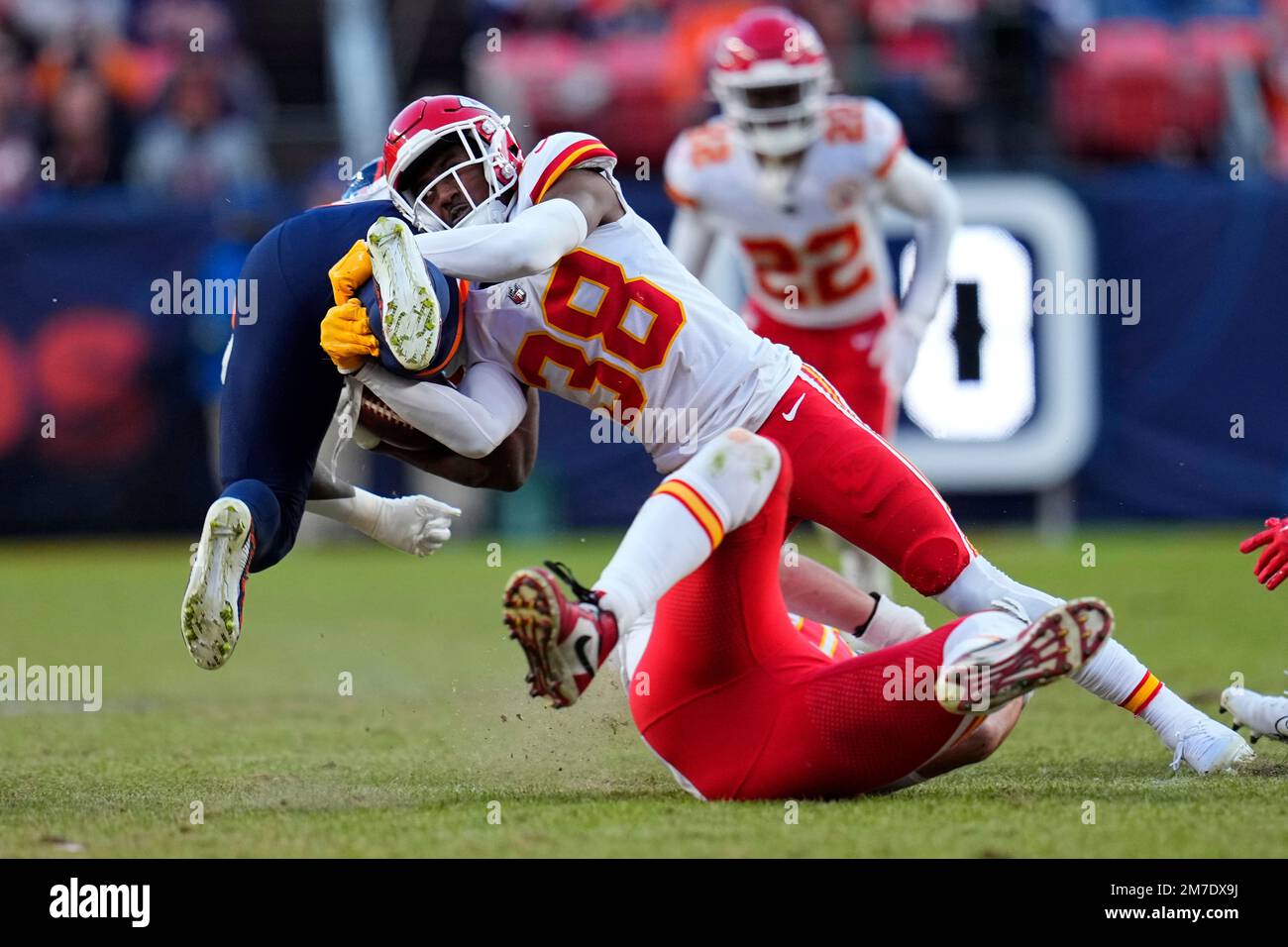 Denver Broncos running back Latavius Murray (28) is tackled by Kansas ...