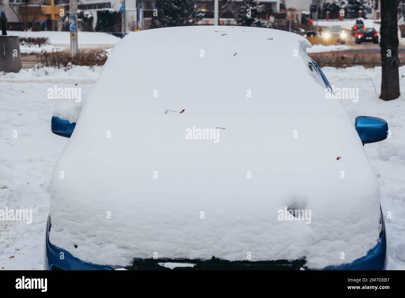 Car covered with snow in Warsaw city, capital of Poland Stock Photo - Alamy